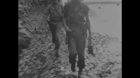 1944 - American soldiers patrol the Admi... | Stock Video | Pond5