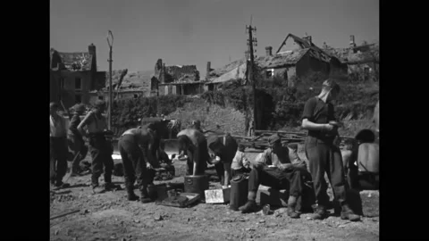 1944 - German POWs take a lunch break wh... | Stock Video | Pond5