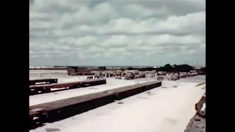 1944 Soldiers load tanks and trucks onto... | Stock Video | Pond5