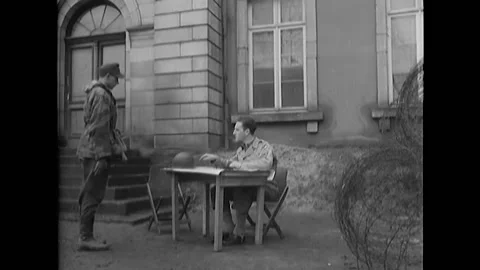 1945 - An American soldier questions a N... | Stock Video | Pond5