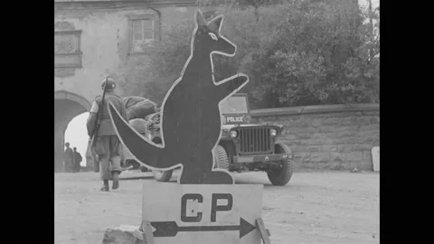 1945 - American soldiers put up signs at... | Stock Video | Pond5
