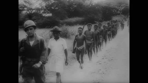 1945 - Filipino guerrilla fighters join ... | Stock Video | Pond5