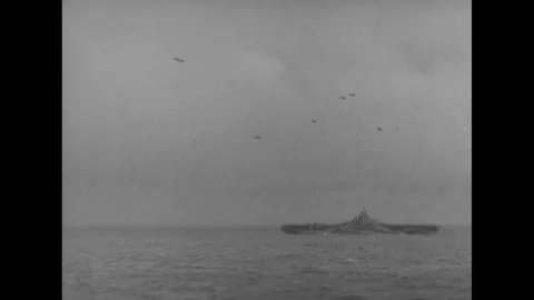 1945 - USAF planes circle a US Navy airc... | Stock Video | Pond5