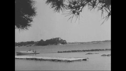 1948 - Japanese men go pearl diving in o... | Stock Video | Pond5