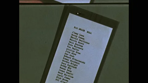 1950s: 3rd grade roll of names on card, ... | Stock Video | Pond5