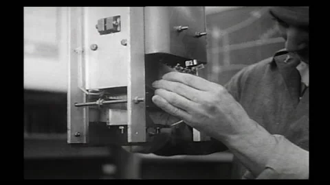1950s Atomic Clock Lowered into Vacuum C... | Stock Video | Pond5