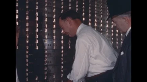 1950s: Banker with keys open deposit box... | Stock Video | Pond5