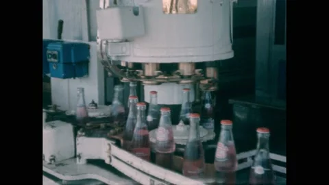 1950s: Bottling plant capping soda bottl... | Stock Video | Pond5