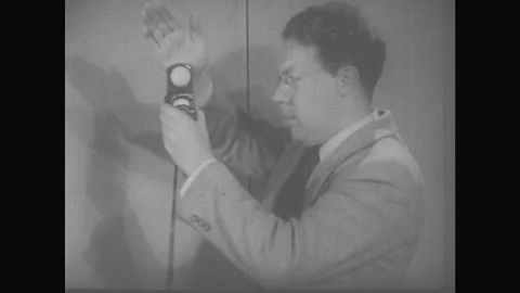 1950s: Camera Man Moves Hand To And Away... | Stock Video | Pond5