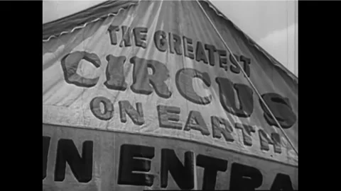 1950s - A carnival barker advertises cir... | Stock Video | Pond5