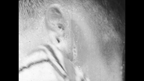 1950s: Close up, cloth washing ear. Boys... | Stock Video | Pond5