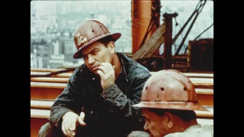 1950s: Construction workers eat and talk... | Stock Video | Pond5