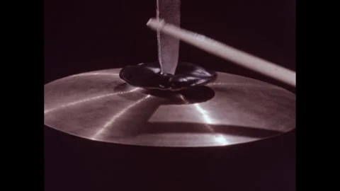 1950s: Cymbal, drum stick hits cymbal li... | Stock Video | Pond5