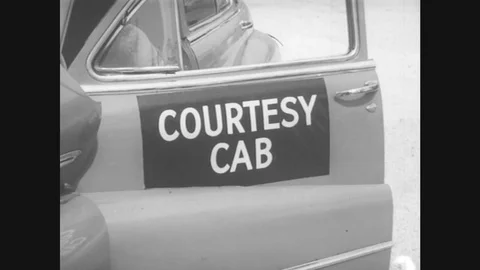 1950s: Door of parked Courtesy Cab car o... | Stock Video | Pond5
