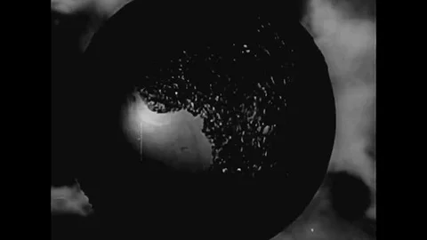 1950s - The earth turning, an atom and, ... | Stock Video | Pond5