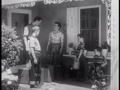 A 1950s family gets ready with a check l... | Stock Video | Pond5