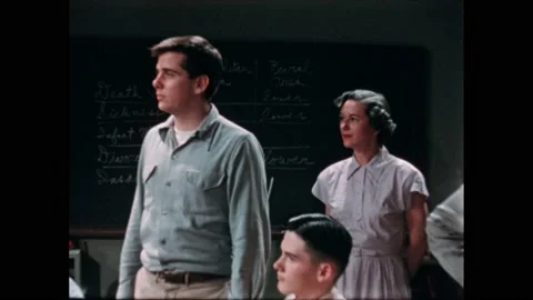 1950s: Female teacher and male student a... | Stock Video | Pond5