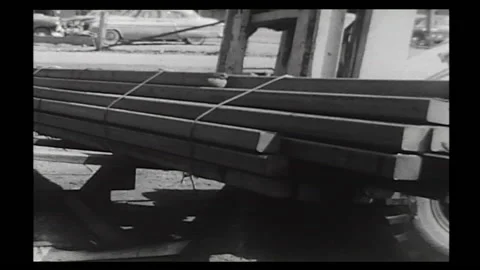 1950s Forklifts Stack Steel Rods at Midl... | Stock Video | Pond5