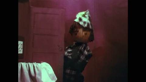 1950s: Hand puppet of man enters room on... | Stock Video | Pond5
