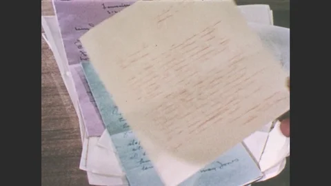 1950s: Hands drop handwritten letters on... | Stock Video | Pond5