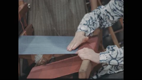 1950s: Hands weaving on loom, motion acr... | Stock Video | Pond5