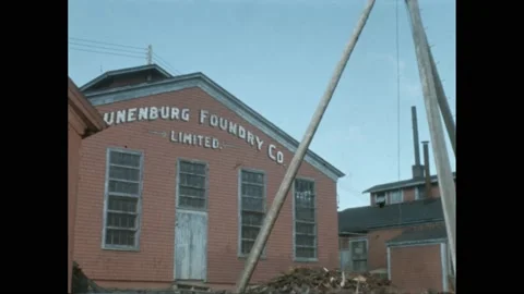 1950s: Industrial building, pile of mate... | Stock Video | Pond5