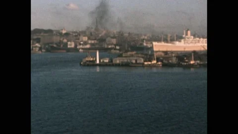 1950s: A large ship slowly sailing throu... | Stock Video | Pond5