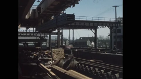 1950s: Loading dock. Large crane moves m... | Stock Video | Pond5
