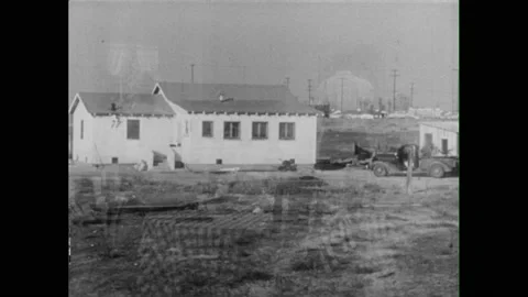 1950s: Long shot of house, highway in ba... | Stock Video | Pond5