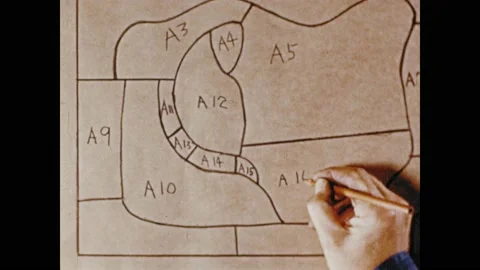1950s: Man labels sections of drawing w... | Stock Video | Pond5