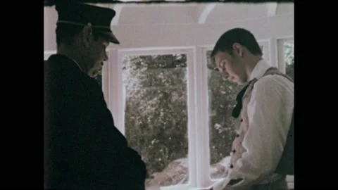 1950s: Man pointing at map another man i... | Stock Video | Pond5