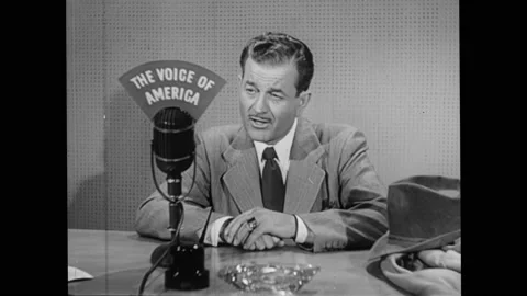 1950s: Man in radio broadcast booth talk... | Stock Video | Pond5