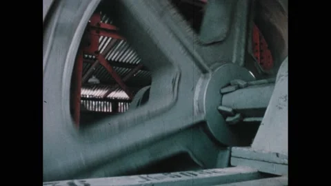 1950s: Man turning wheel. Wheels turning... | Stock Video | Pond5