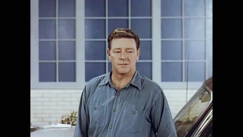 1950s: Men stand in parking lot. Man wa... | Stock Video | Pond5