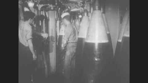 1950s: Men work in bomb factory. Tanks r... | Stock Video | Pond5