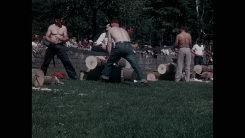 1950s: Pairs of men cut logs with crossc... | Stock Video | Pond5