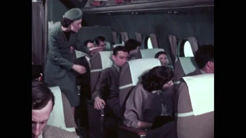 1950s: Plane full of people, flight atte... | Stock Video | Pond5