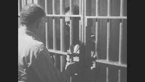 1950s: police officer in uniform talks, ... | Stock Video | Pond5