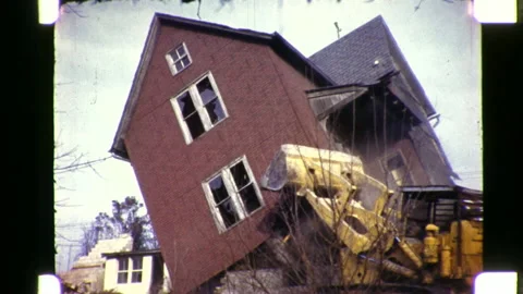 1950s Pushing over a brick house with a ... | Stock Video | Pond5