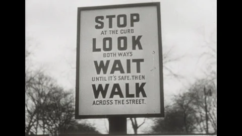 1950s: Sign: Stop, Look, Wait, Walk. Nei... | Stock Video | Pond5