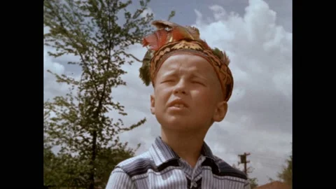 1950s: Slate. Boy walks backwards, stops... | Stock Video | Pond5