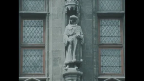 1950s: Statues on building, zoom in. Ext... | Stock Video | Pond5