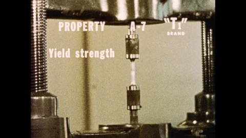 1950s: Steel sample sits in tensile stre... | Stock Video | Pond5