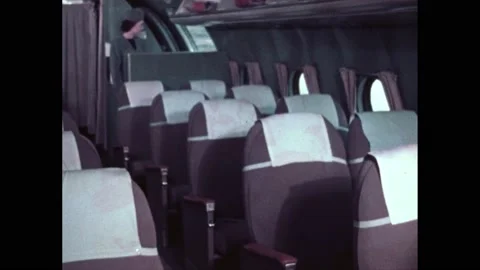 1950s: Stewardess handing out magazines.... | Stock Video | Pond5