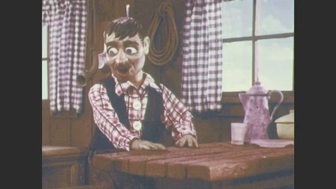 1950s: Stop-motion animation. Man sits ... | Stock Video | Pond5