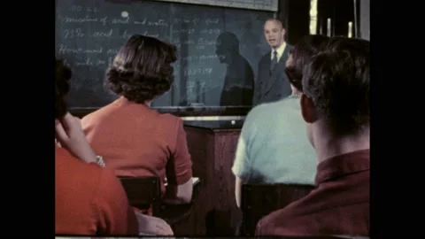 1950s: Teacher instructs classroom at bl... | Stock Video | Pond5
