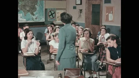 1950s: Teachers speaks to classroom full... | Stock Video | Pond5