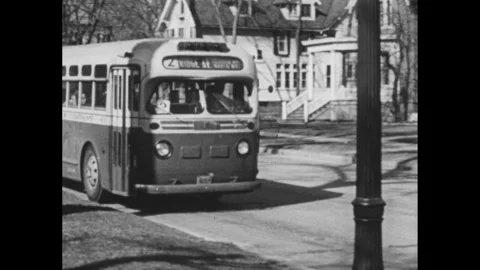 1950s: Transit bus driving up the reside... | Stock Video | Pond5
