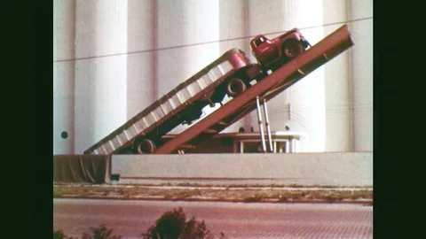 1950s: Truck lifted on ramp, tilt up gra... | Stock Video | Pond5