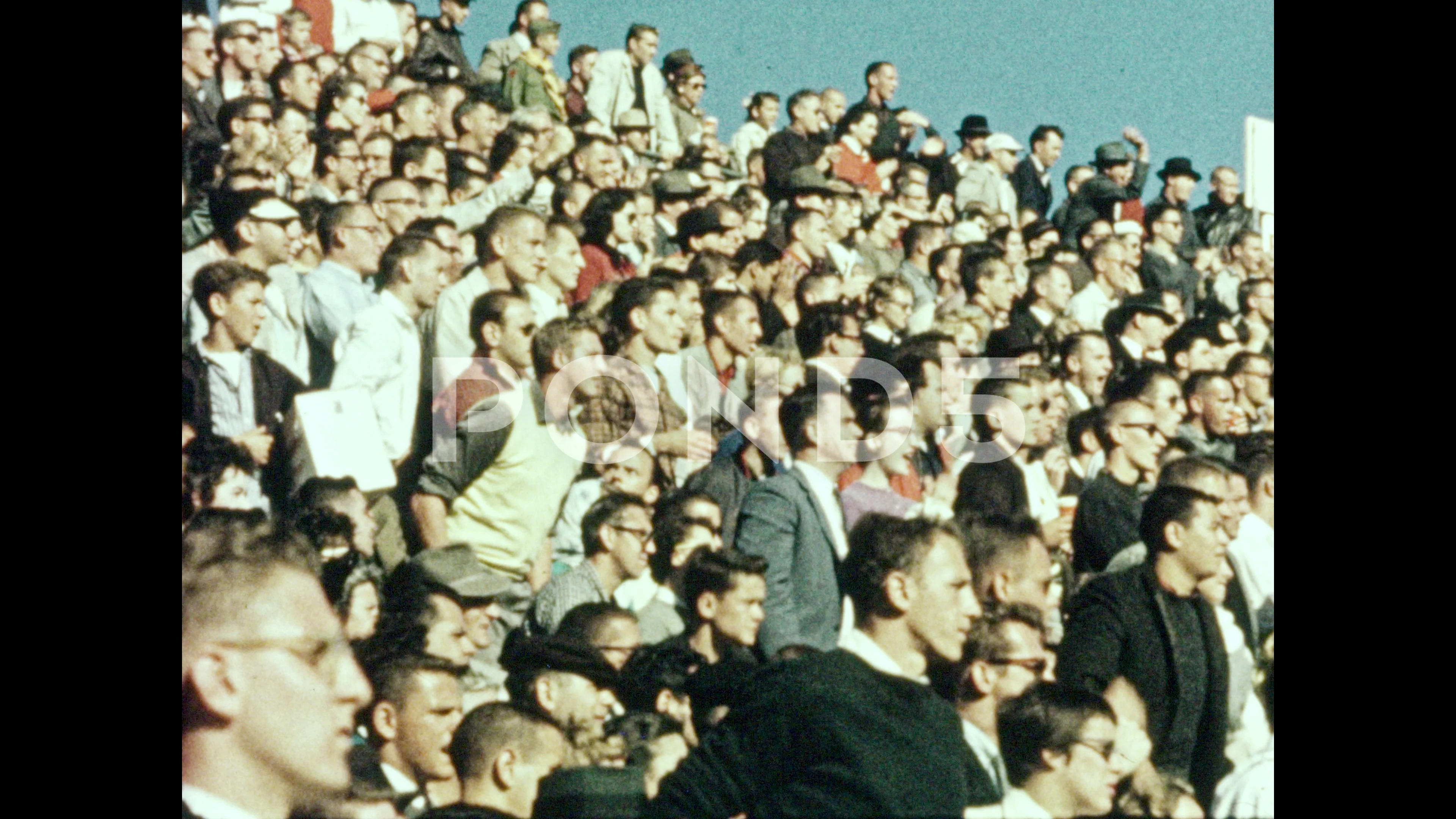 Crowd Of People Cheering Football